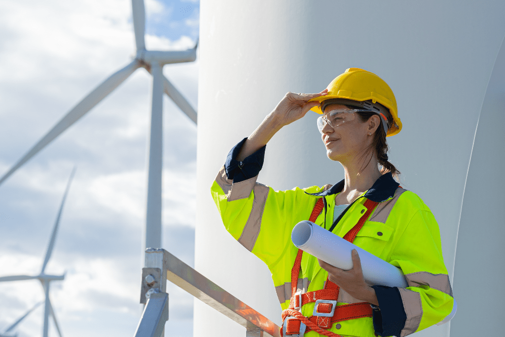 Female wind engineer looking into distance